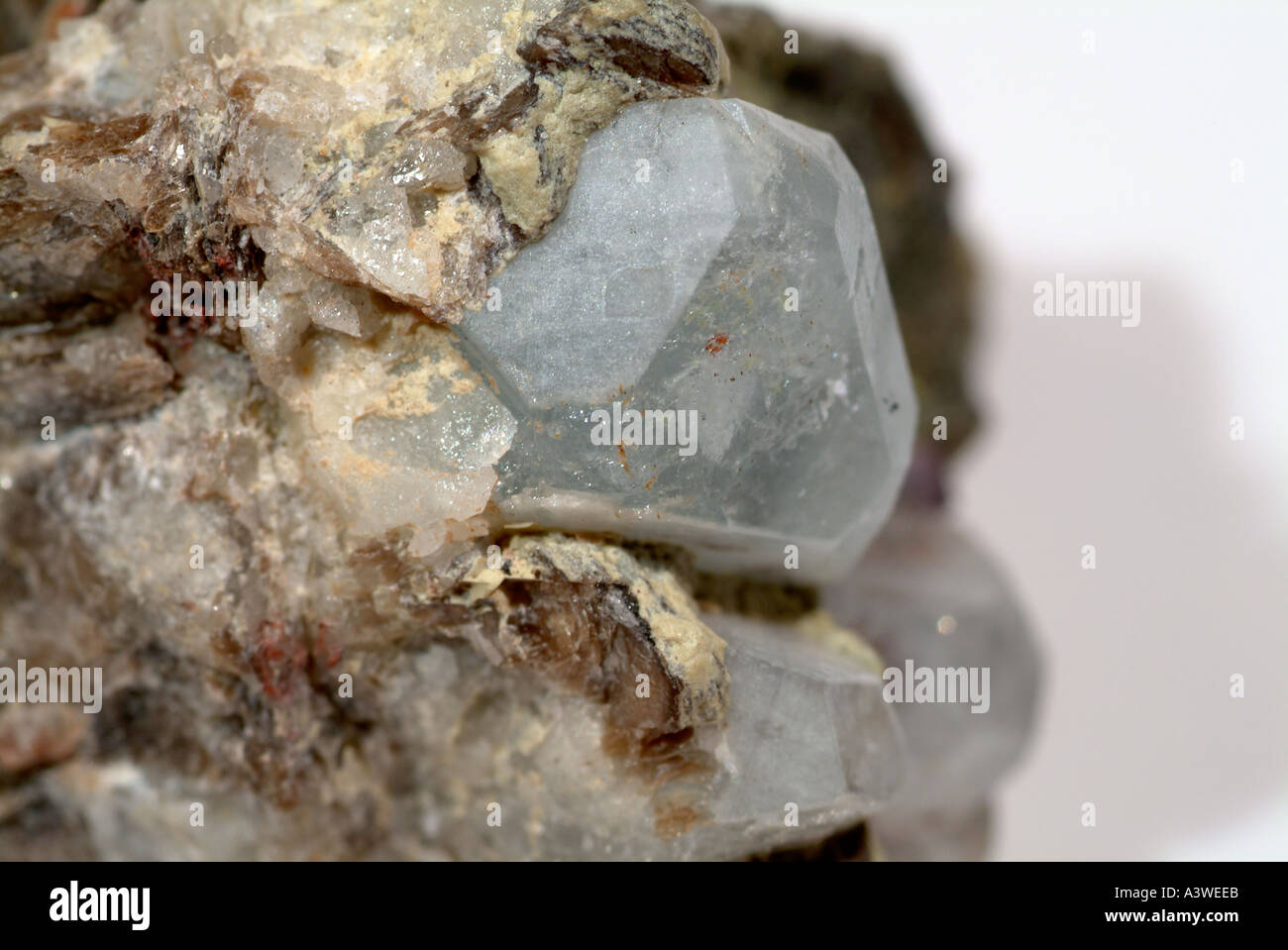 Mineral Topaz, Ice blue crystal on mica-pegmatite matrix, Goonbarrow ...