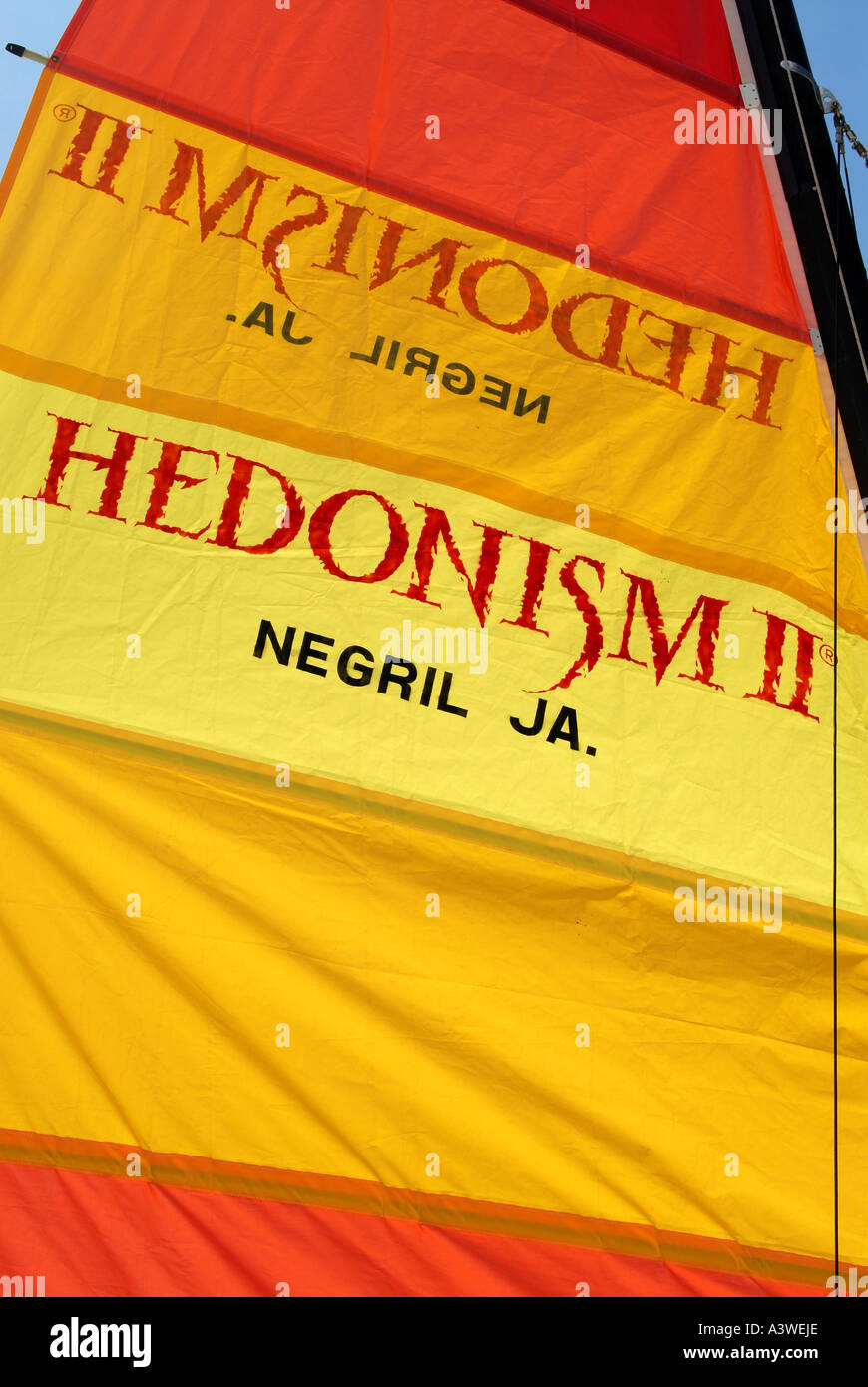 Hedonism logo on windsurfer Negril Jamaica Stock Photo - Alamy