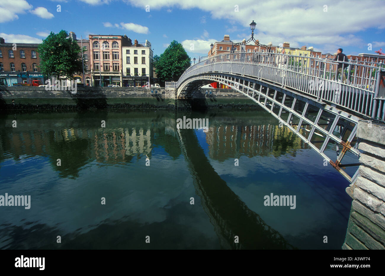 Ha penny or Halfpenny Bridge over River Liffey from Wellington Quay ...