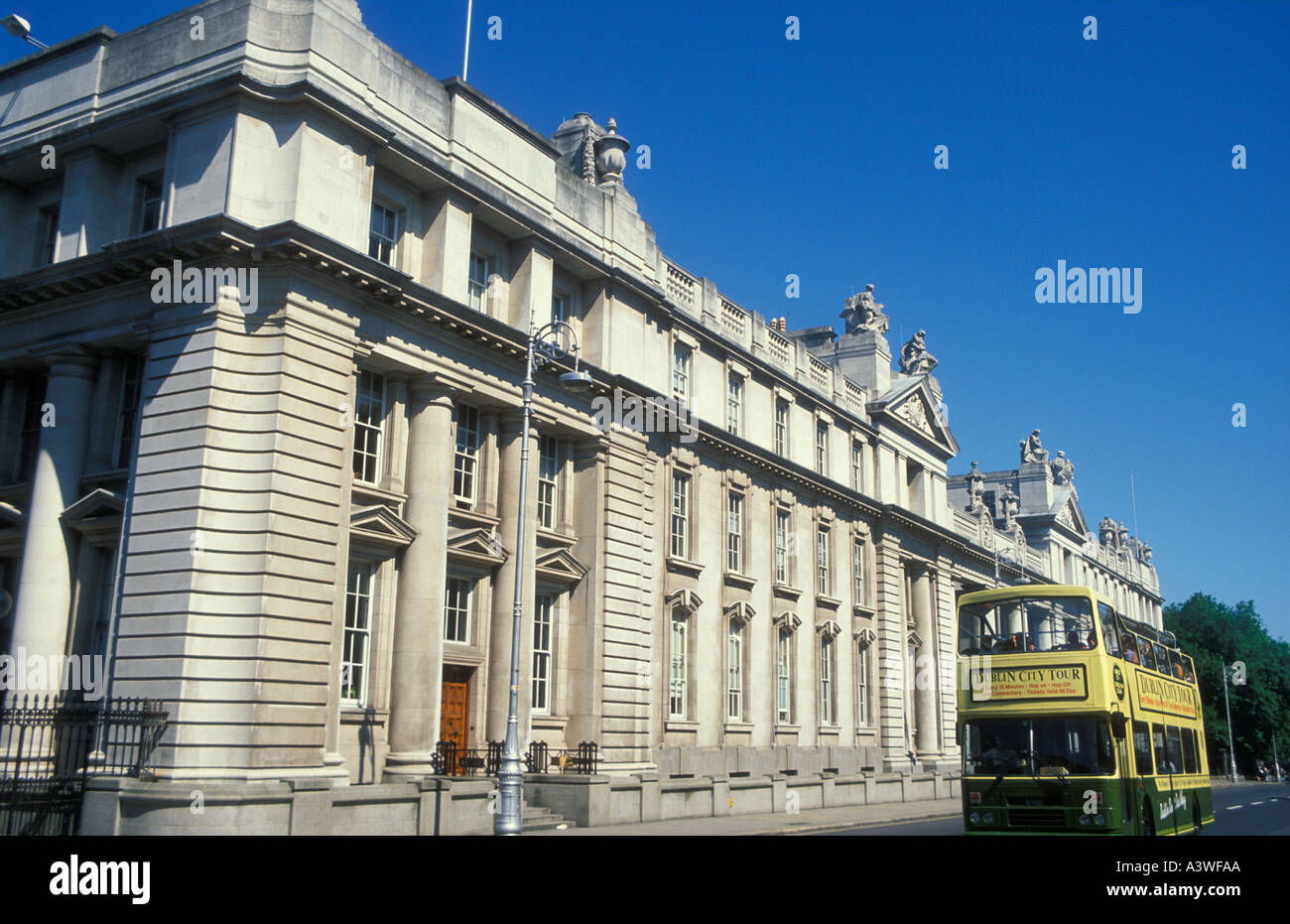 Tour bus and Front facade of the Irish Government buildings Upper ...