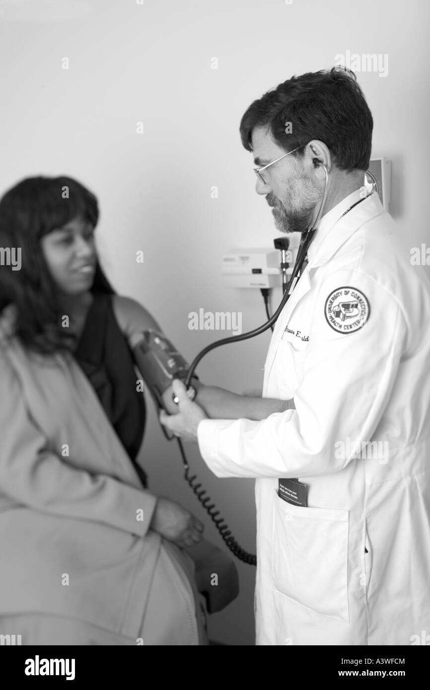 Doctors office patient Black and White Stock Photos & Images - Alamy