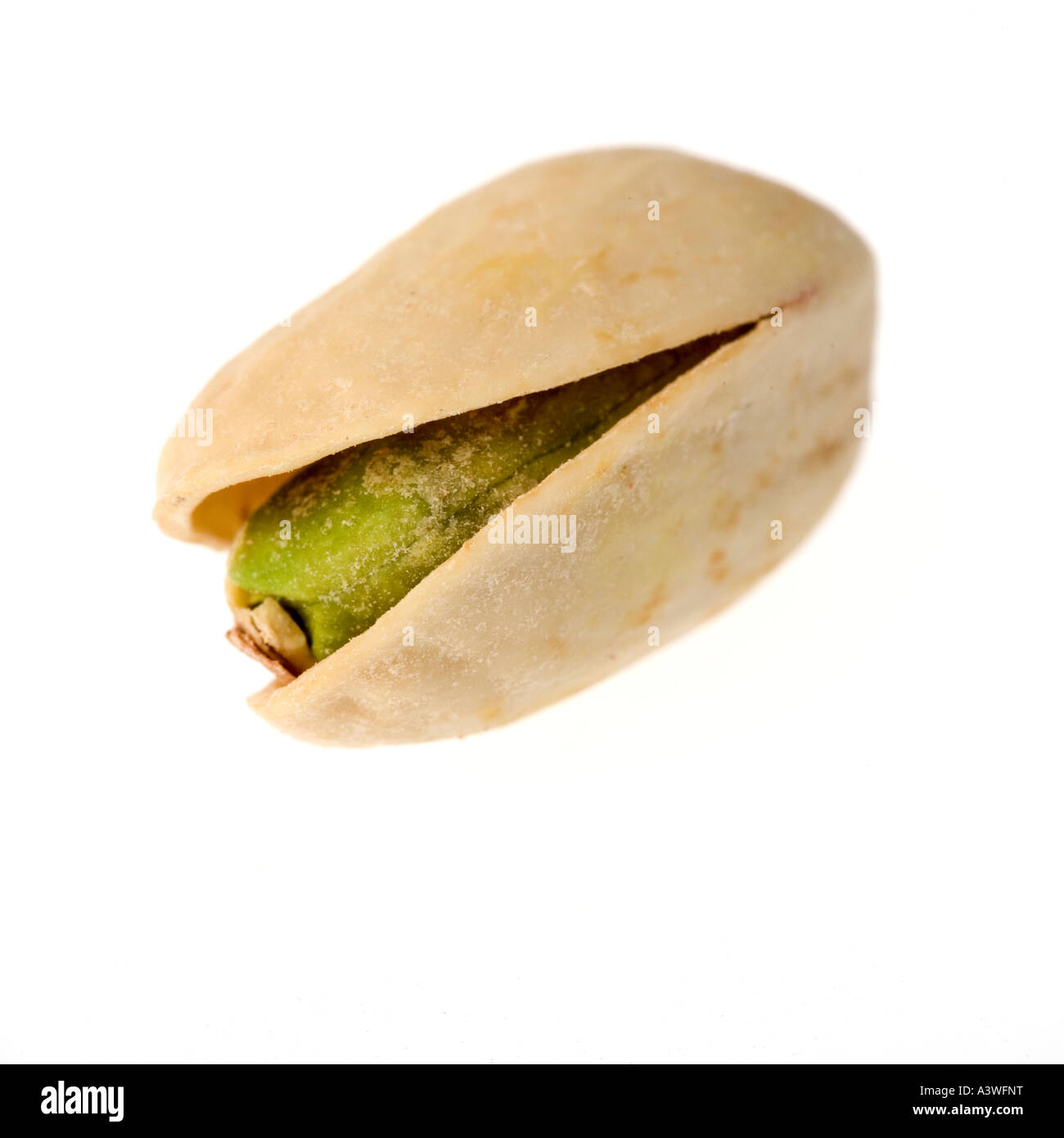 Pistachio nut cut-out on white background Stock Photo - Alamy
