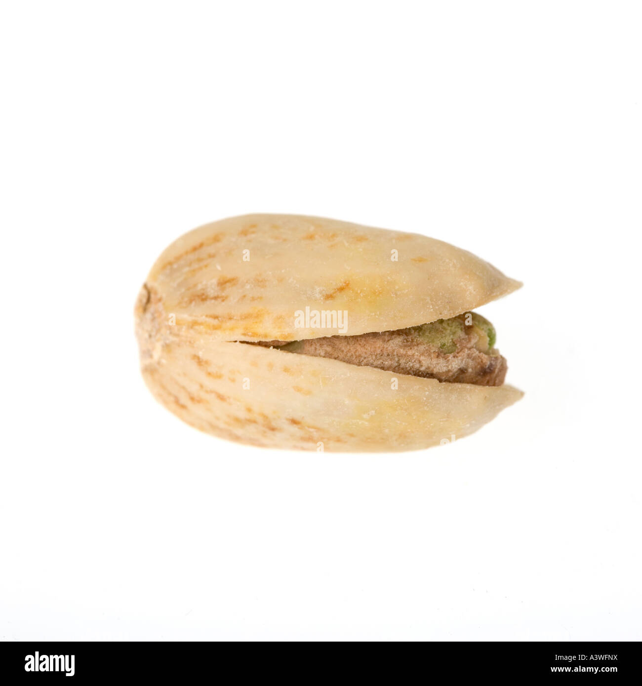 Pistachio nut cut-out on white background Stock Photo - Alamy