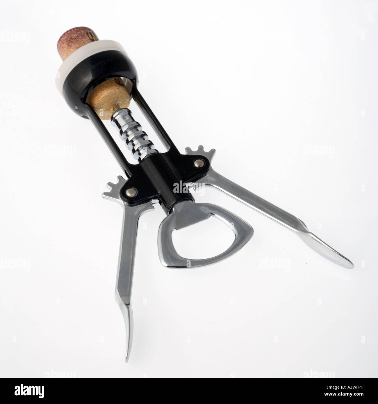Corkscrew with cork on white background cut-out Stock Photo - Alamy