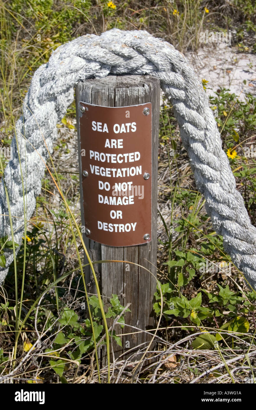 Rope and sign protecting Sea Oats on Gulf of Mexico beach. Indian ...