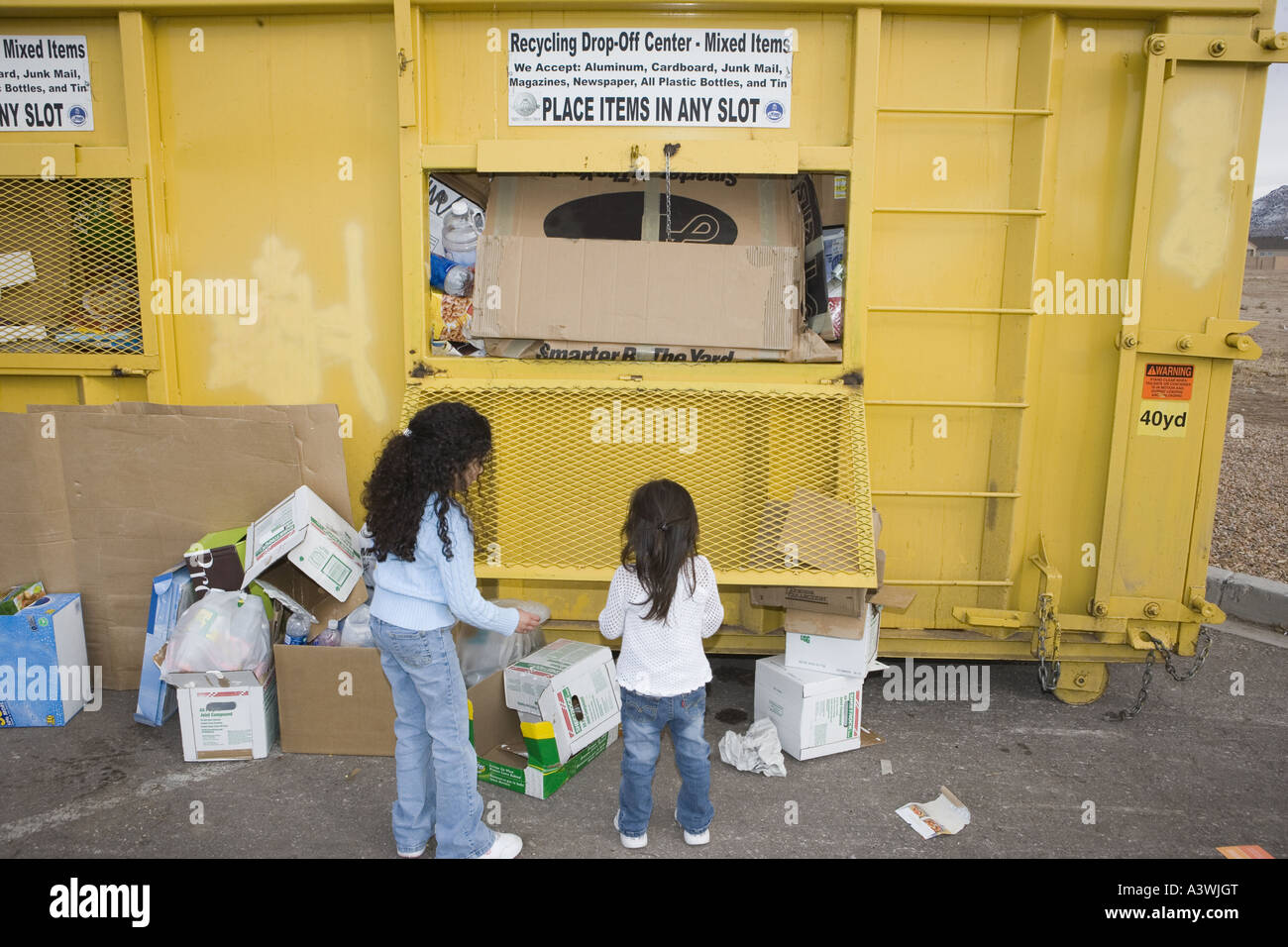 children at recycling center sorting materials to be recycled Stock ...
