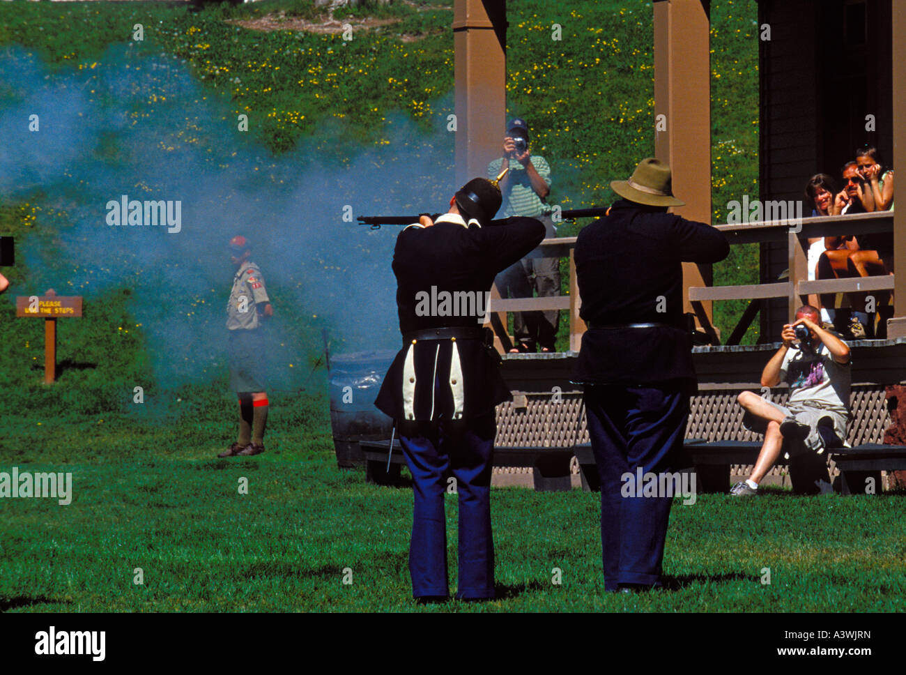 REENACTORS FIRE MUSKETS ON THE PARADE GROUNDS OF FORT MACKINAC ON ...