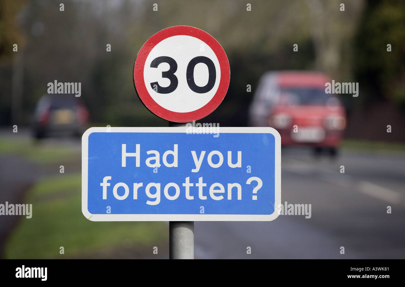 Speed restriction signs with added warnings in a Warwickshire village ...