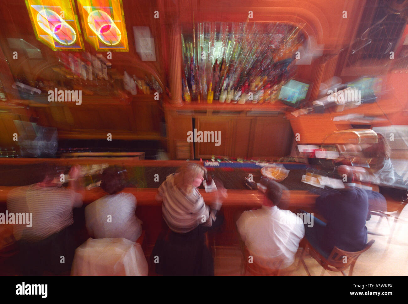 Bar scene in Michigan with blurry camera technique Stock Photo - Alamy