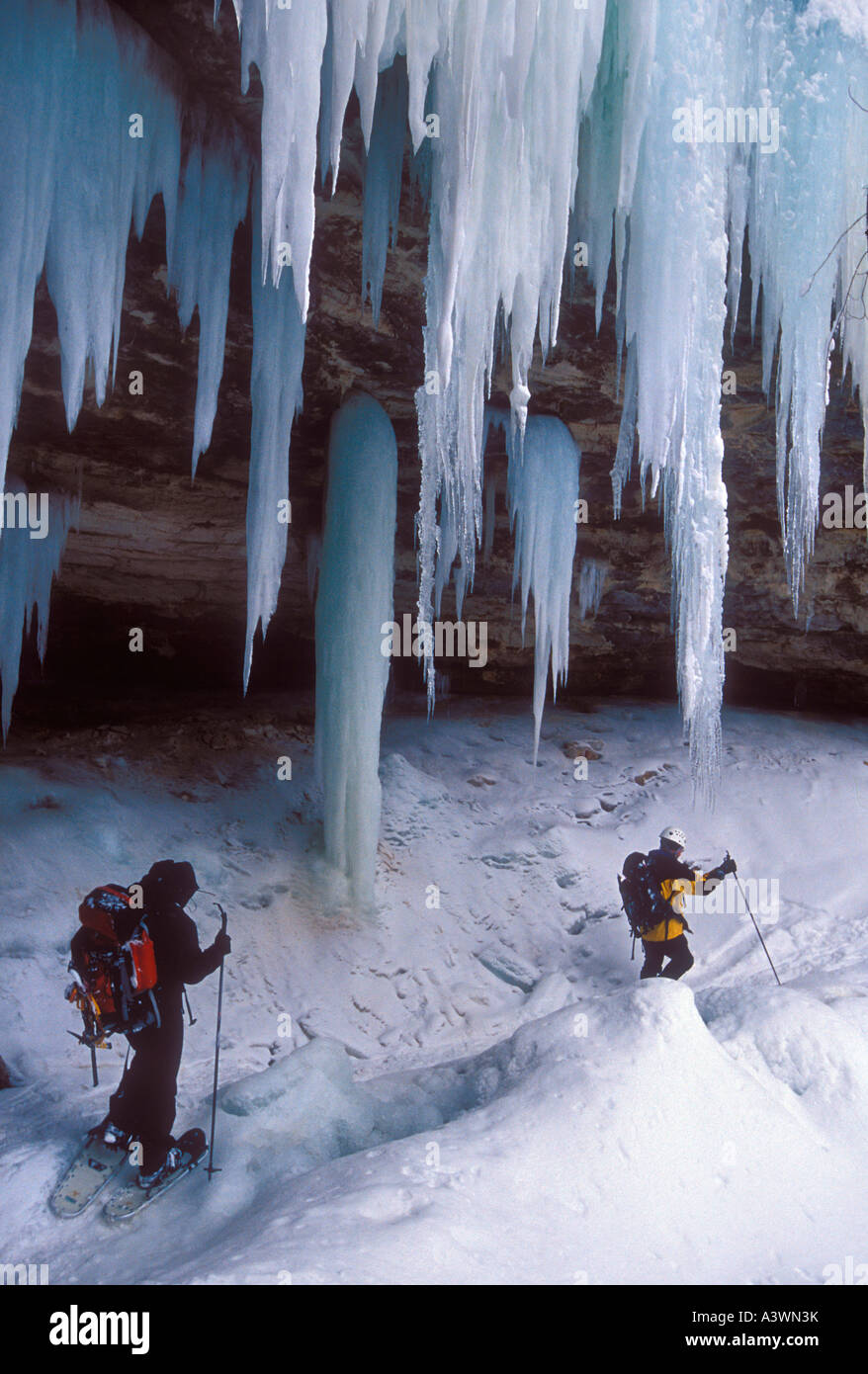 Ice climbers pass cliffs and ice formations in Pictured Rocks National ... Ice climbers pass cliffs and ice formations in Pictured Rocks National ...