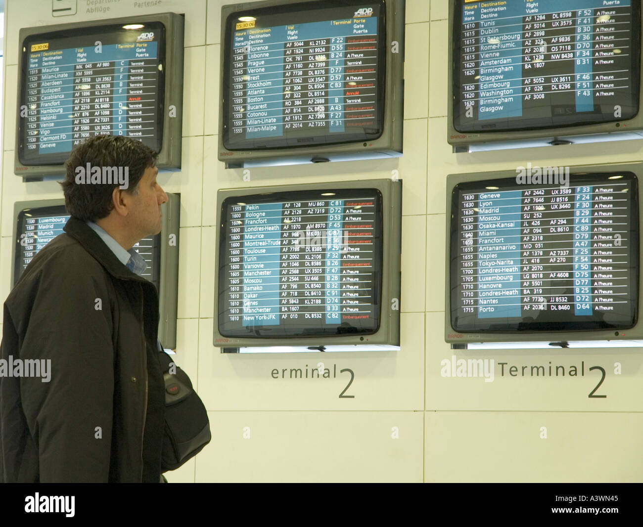 141004 Charles De Gaulle airport France Travellers wait at flight ...