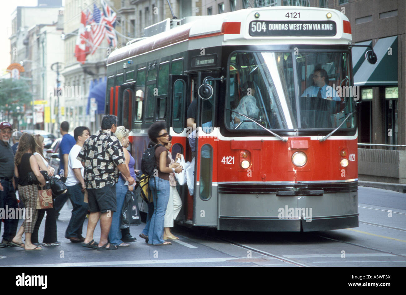 Passengers boarding a street tram in Toronto Ontario Canada Stock Photo ...