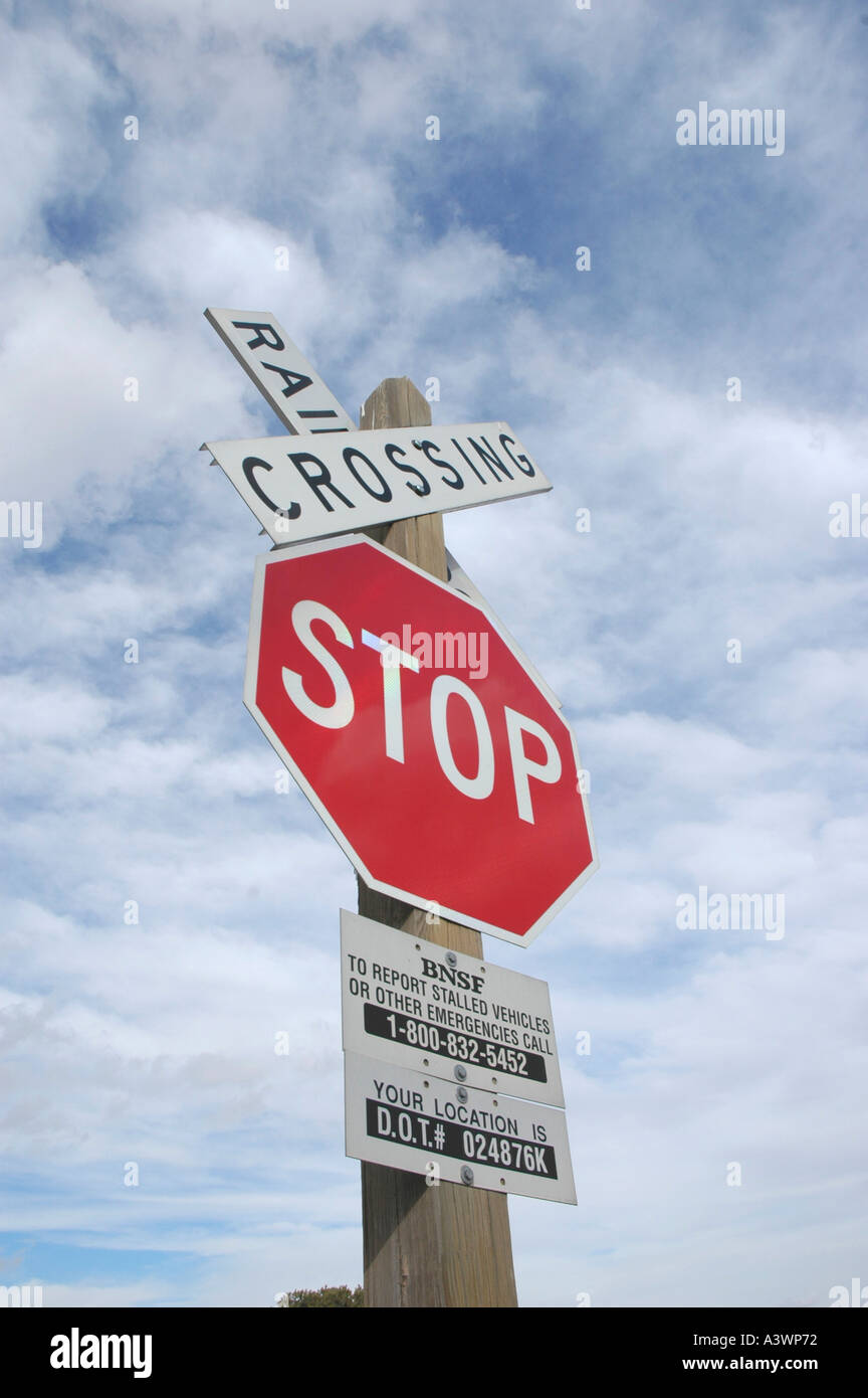 Crossing and stop signs at railroad crossing in Texas and Arizona Stock ...