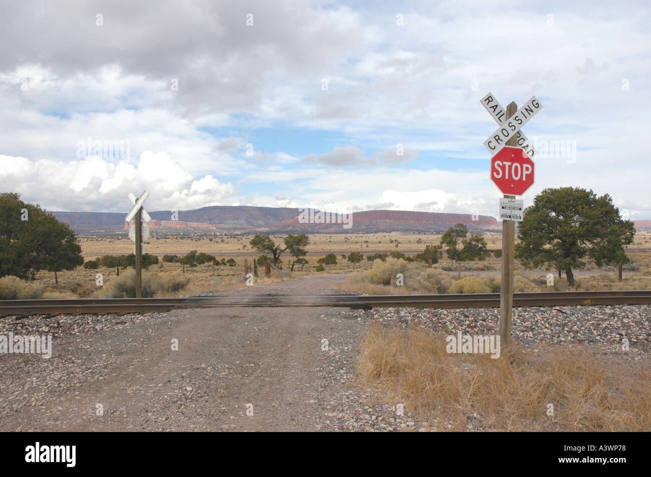 Crossing and stop signs at railroad crossing in Texas and Arizona Stock ...