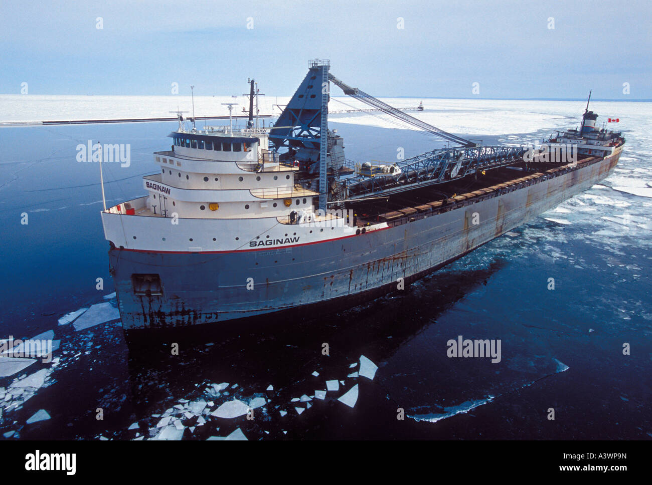 The freighter Saginaw enters the upper harbor of Marquette Michigan ...