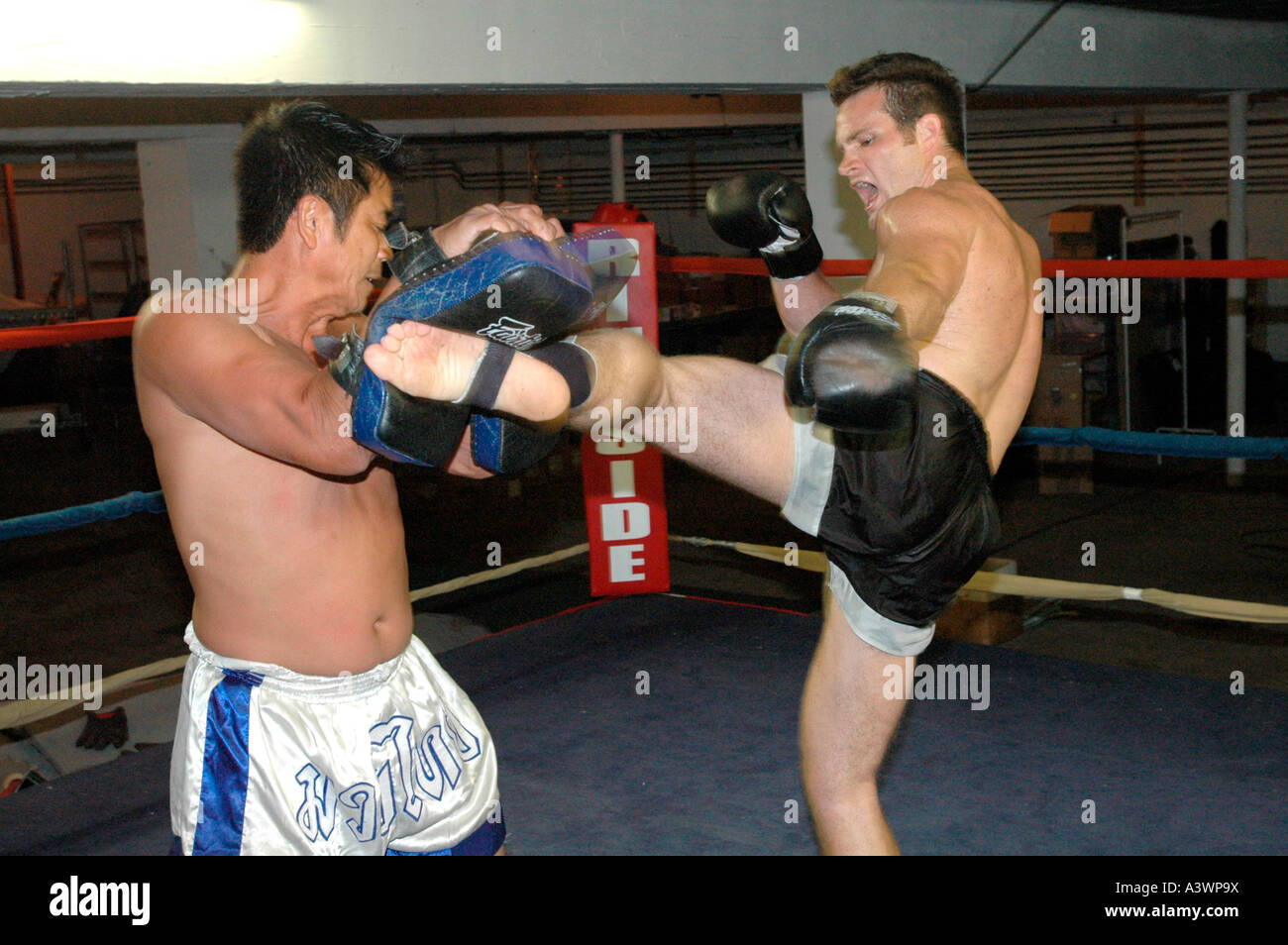 Kickboxer Dan Pemble of Marquette Michigan spars with his coach Kak ...