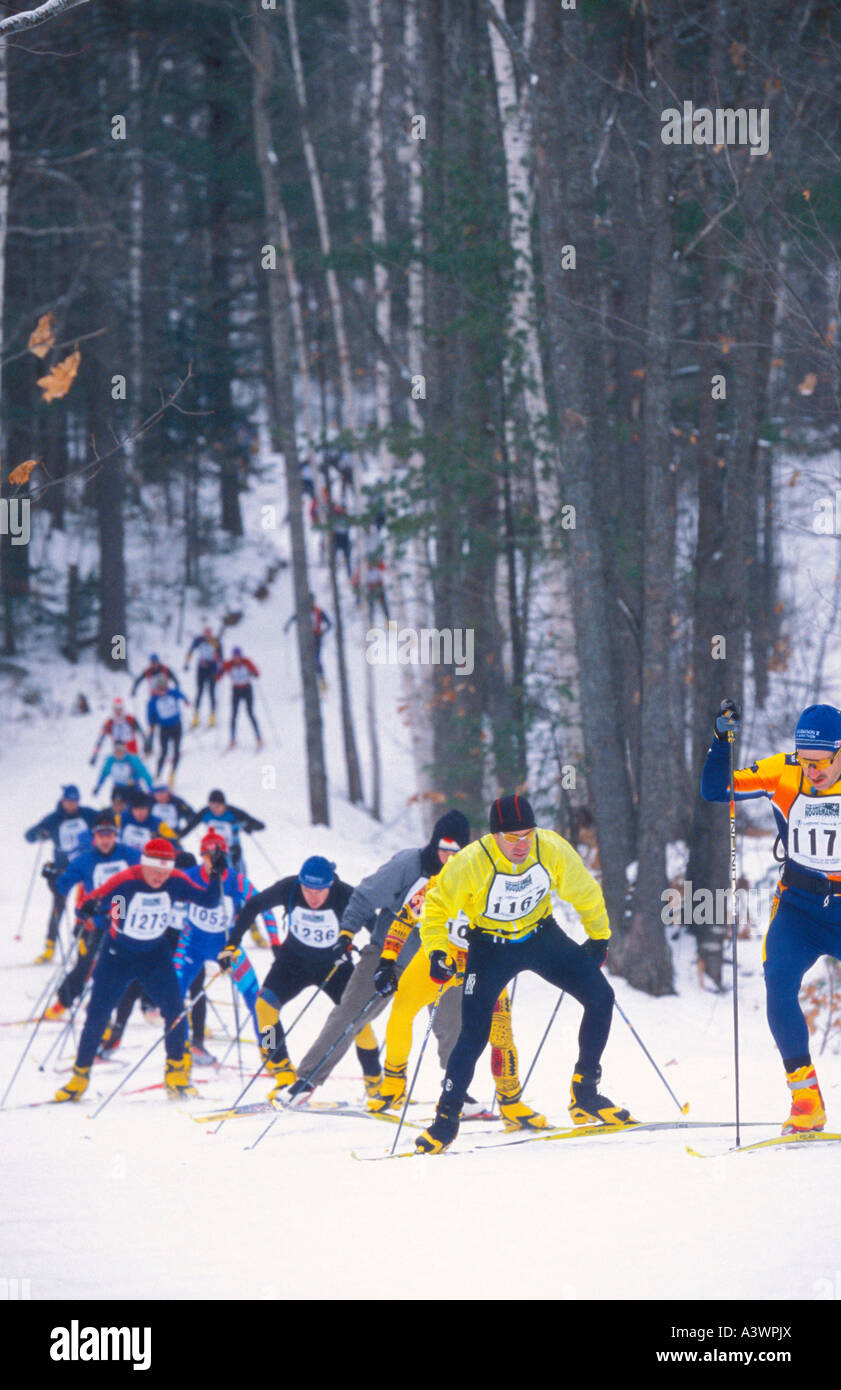 PARTICIPANTS IN THE NOQUEMANON CROSS COUNTRY SKI MARATHON CLIMB A HILL ...
