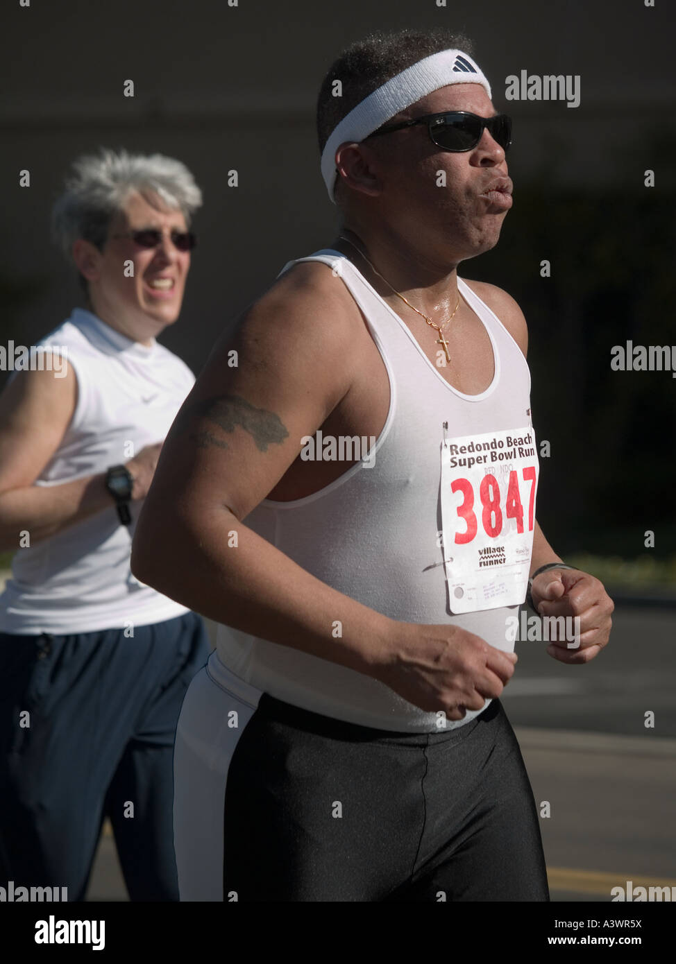 Middle aged Black runner competes in 10K Stock Photo - Alamy