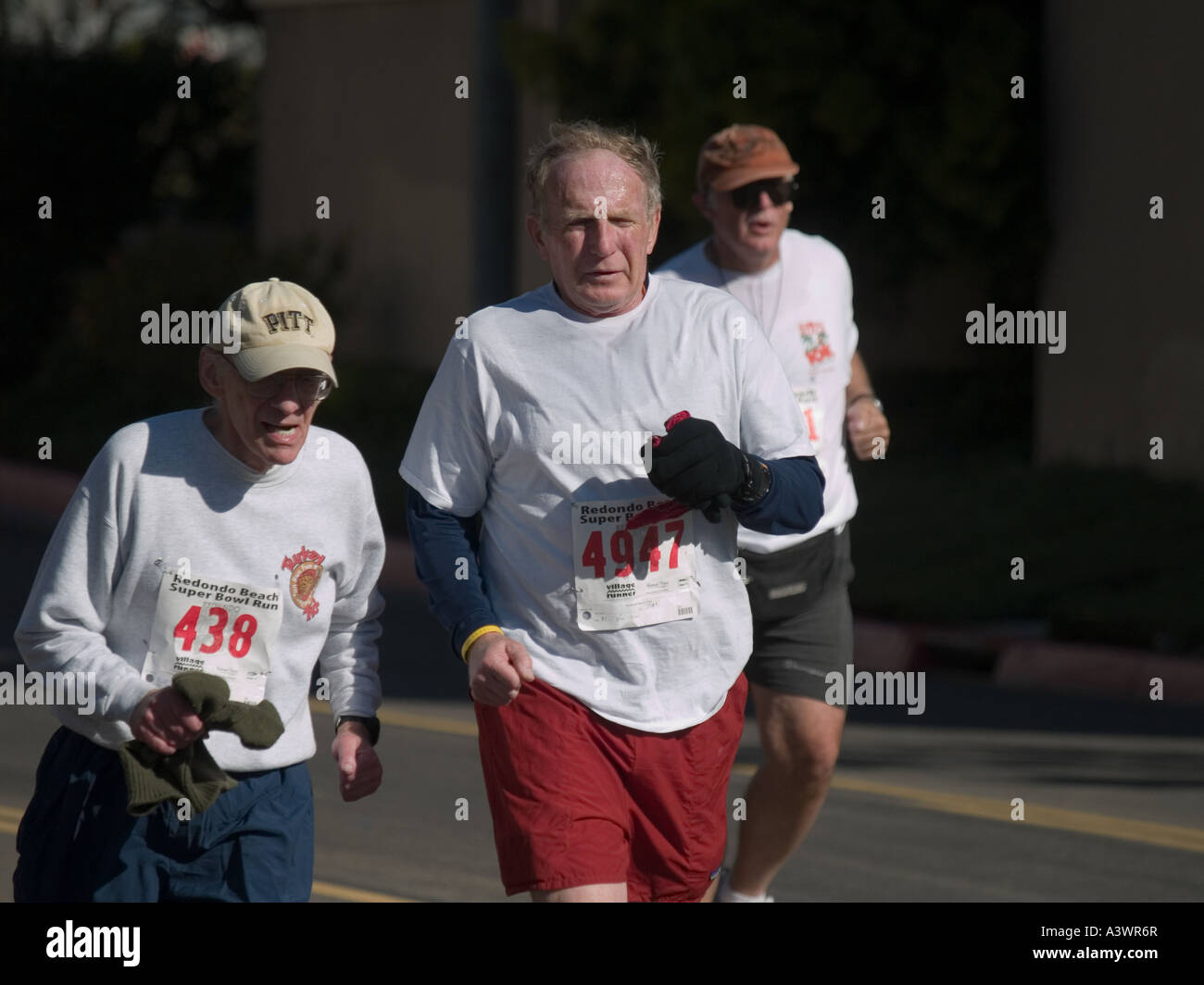 Elderly men line beach hi-res stock photography and images - Alamy