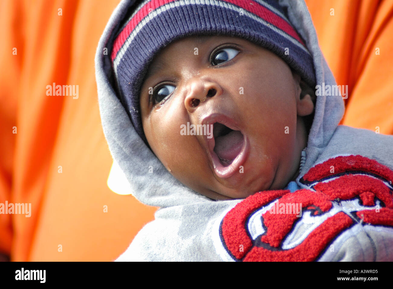 African American Black child Baby, a boy on a cold day with his Mom in ...