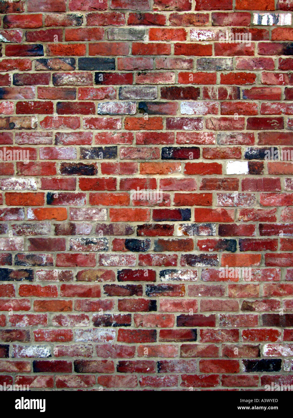 section of mixed red brick wall background Stock Photo - Alamy