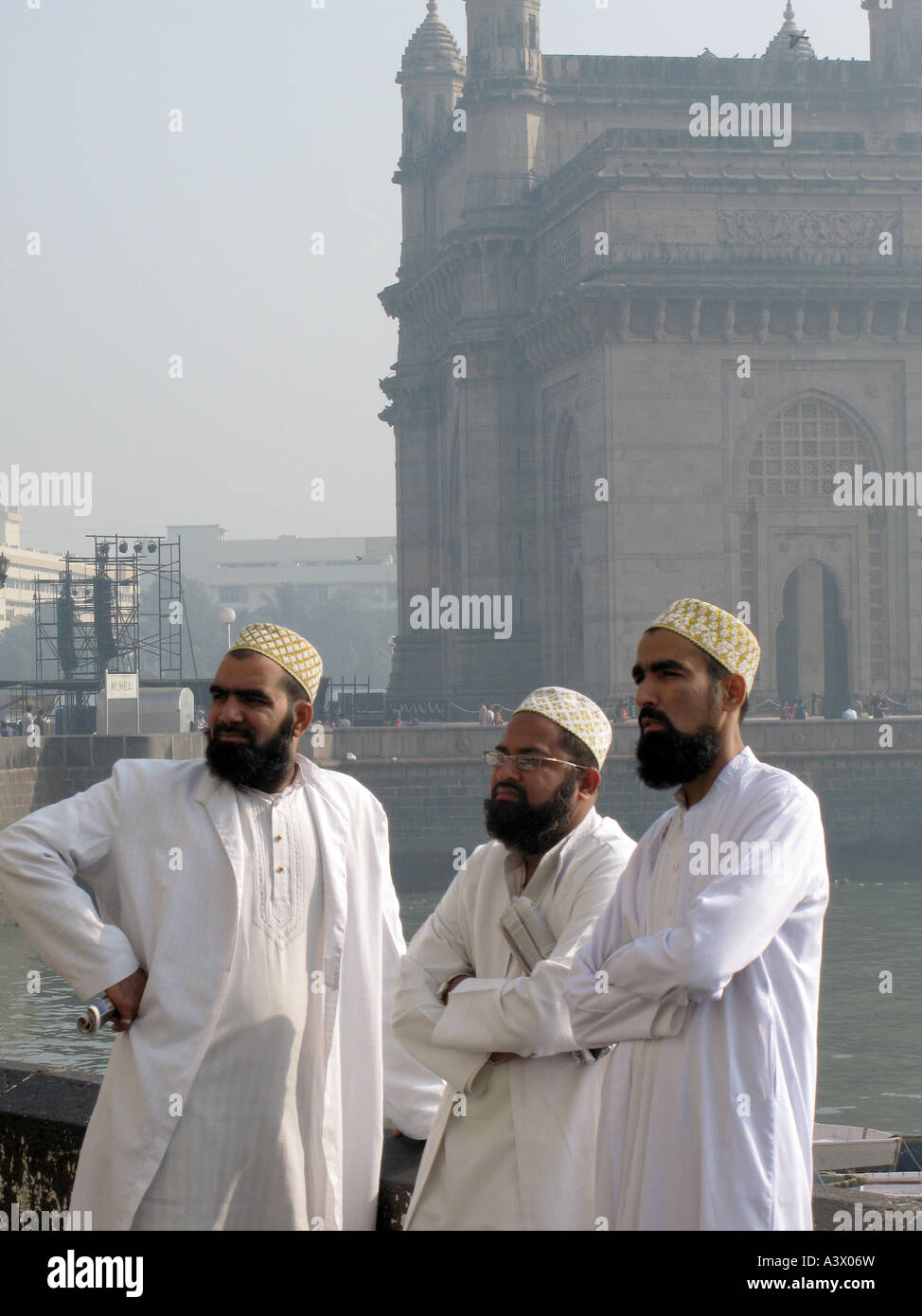 INDIA Muslim men by Gateway to India monument Mumbai Photo Julio ...