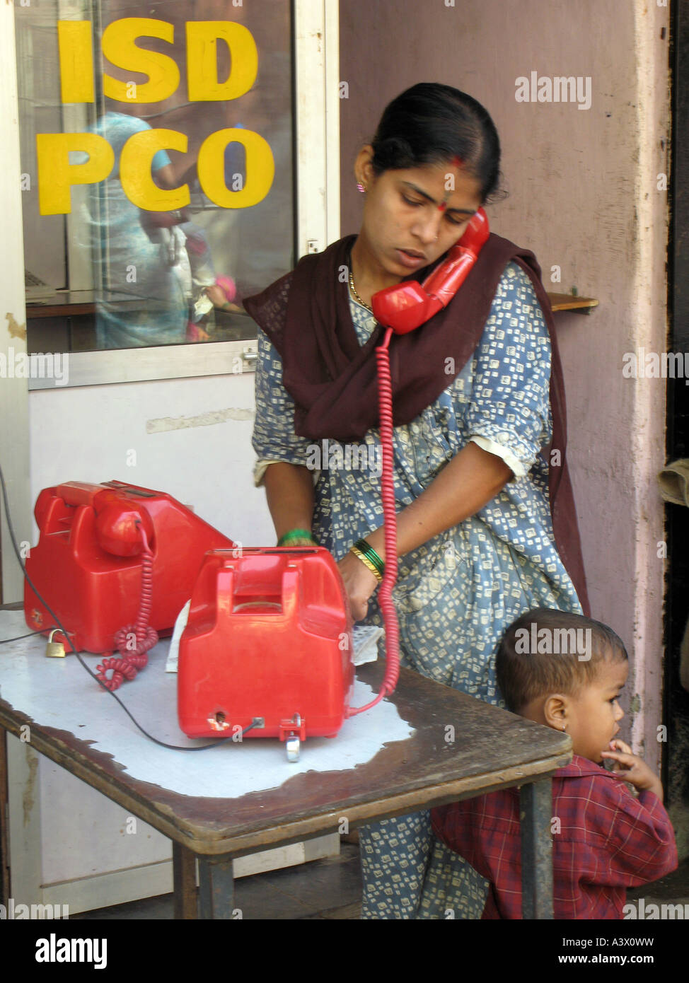 INDIA Local and long distance call shop in a street corner in Mumbai ...