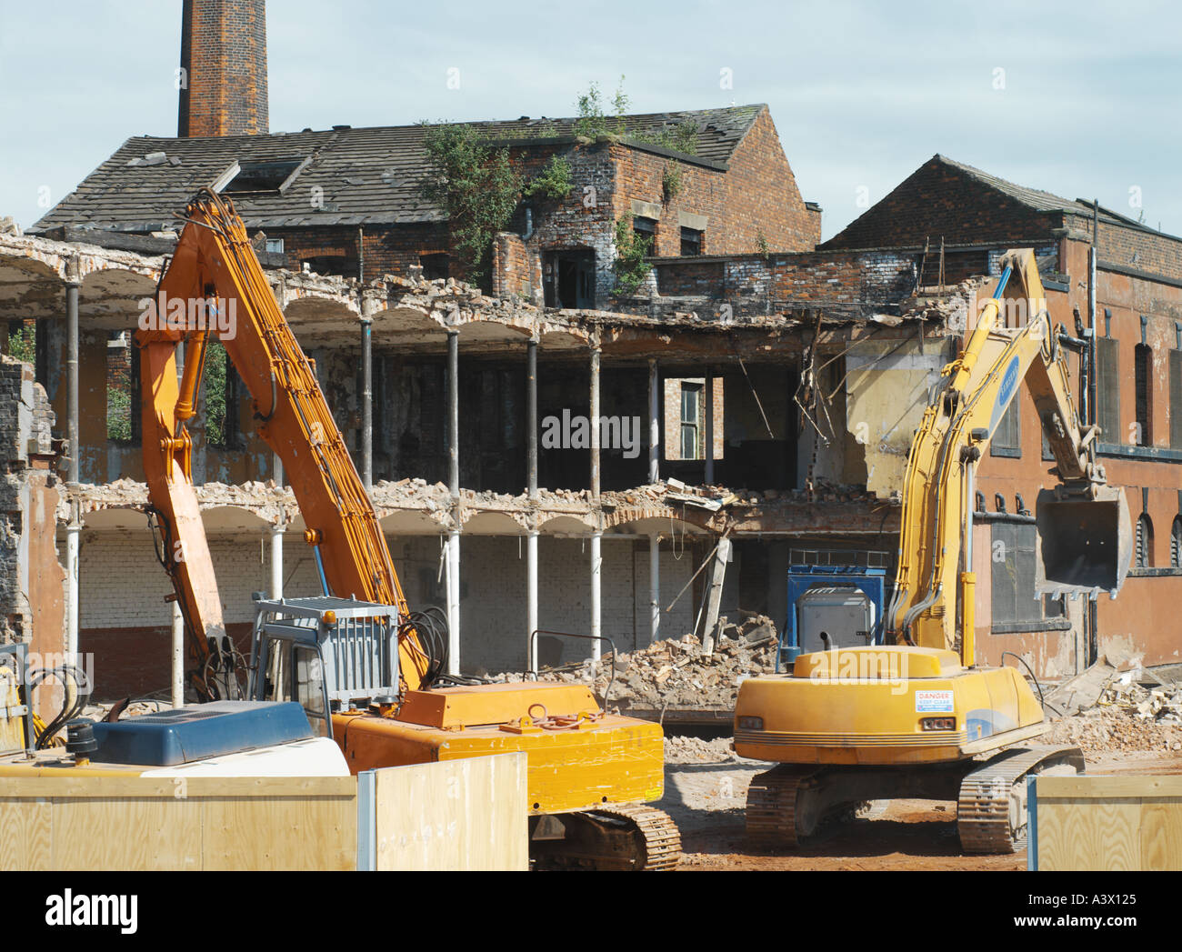 Old Mill Victorian demolition machinery foreground Stock Photo - Alamy