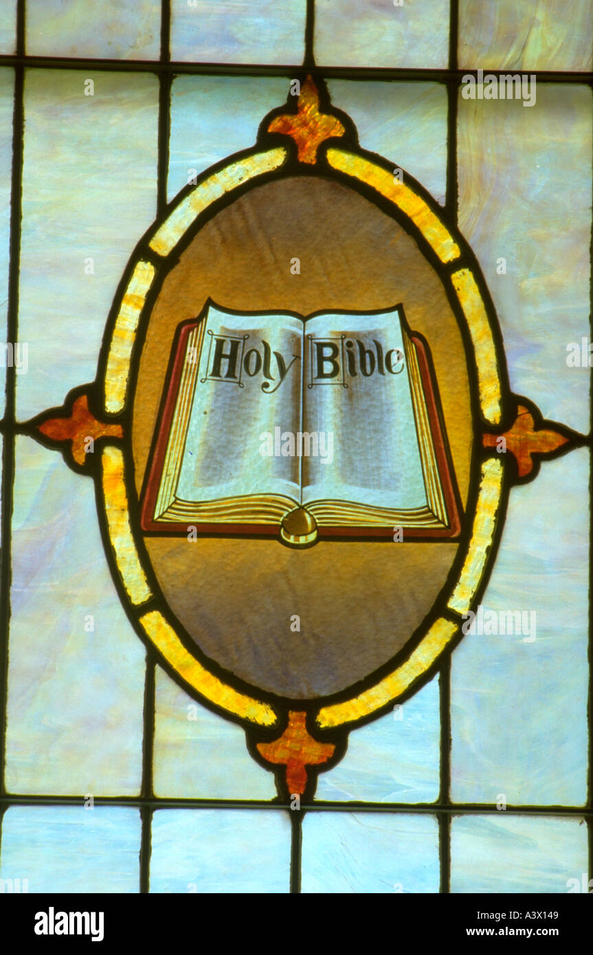 Stained glass window of open Bible at Holy Communion Church ...