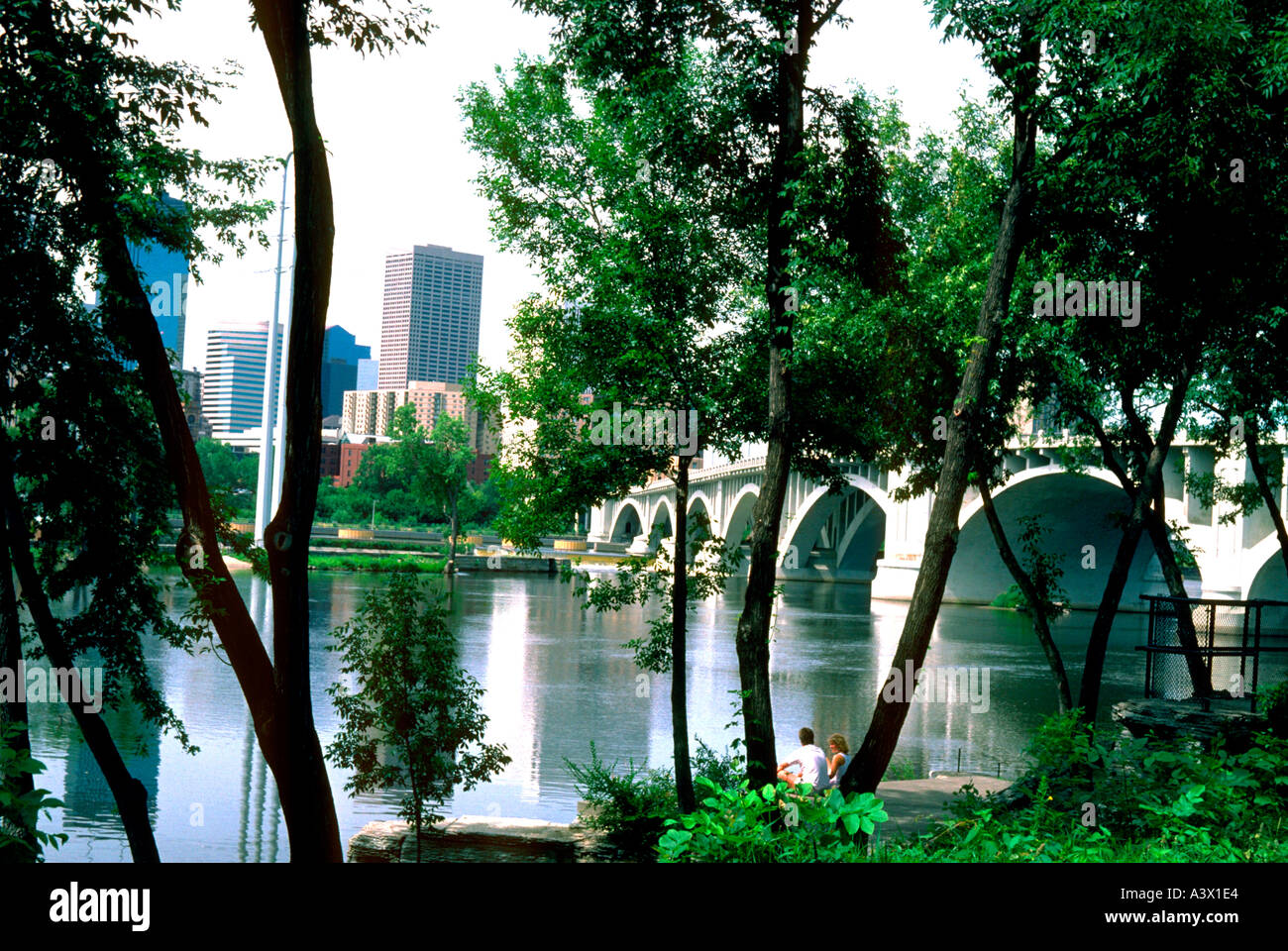 Downtown skyline across the Mississippi River flowing under the Stone ...