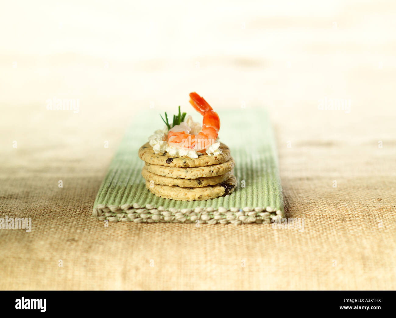 Cheese and Biscuits served as a tower with tail on prawn and cream ...