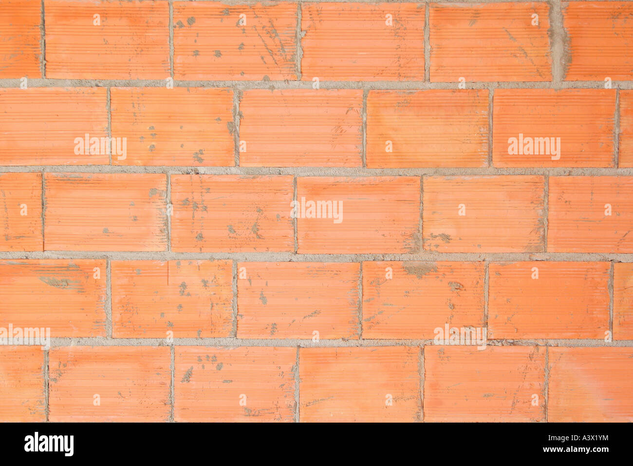 unfinished wall of bricks inside a construction site Stock Photo - Alamy
