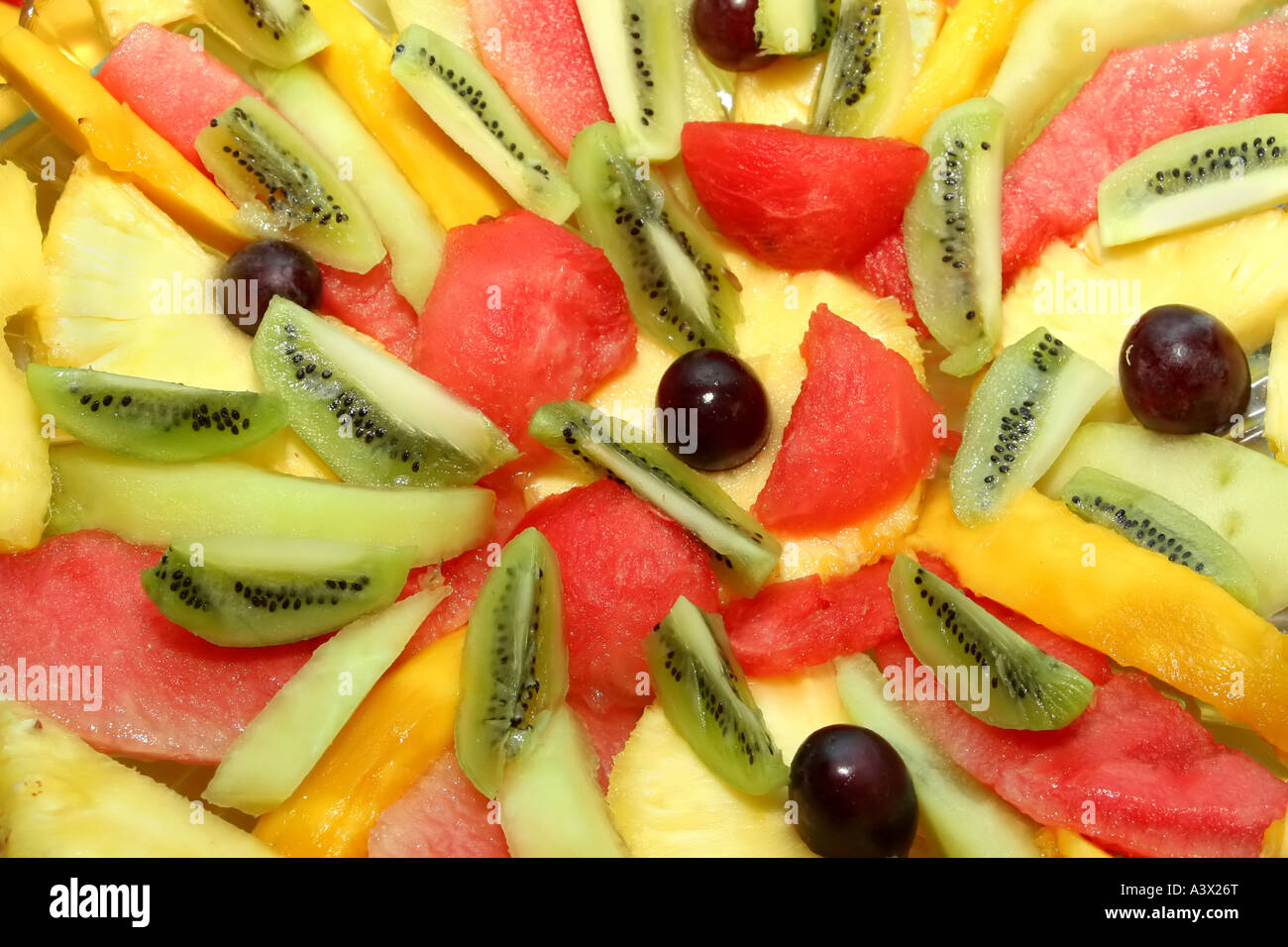 several sliced pieces of fruit for background Stock Photo - Alamy