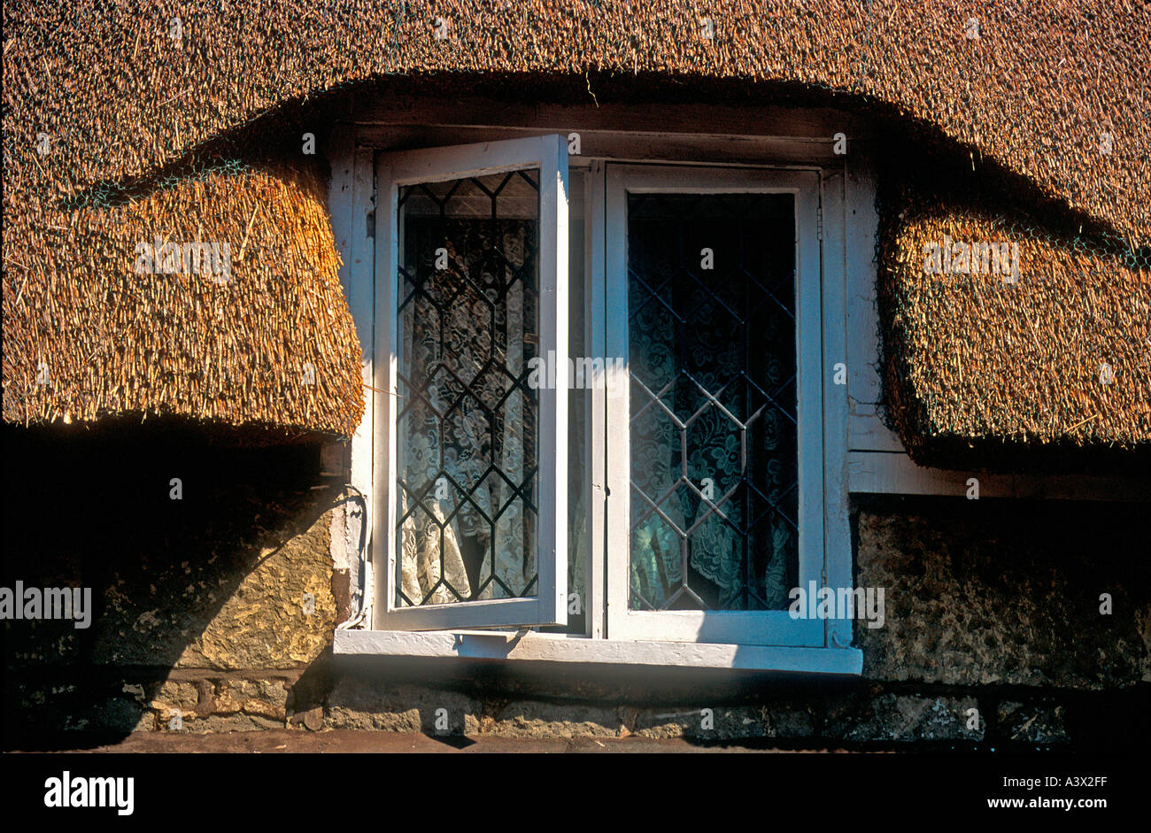 Thatched house eaves and casement window Shanklin Isle of Wight England ...