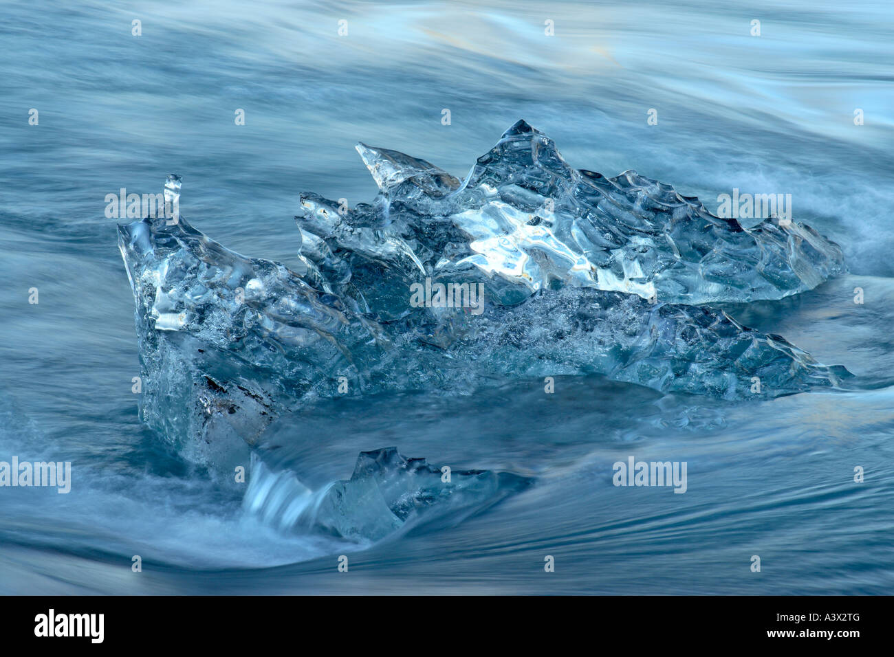 Jokulsarlon glacial lagoon Iceland melting clear iceberg blue ice in ...