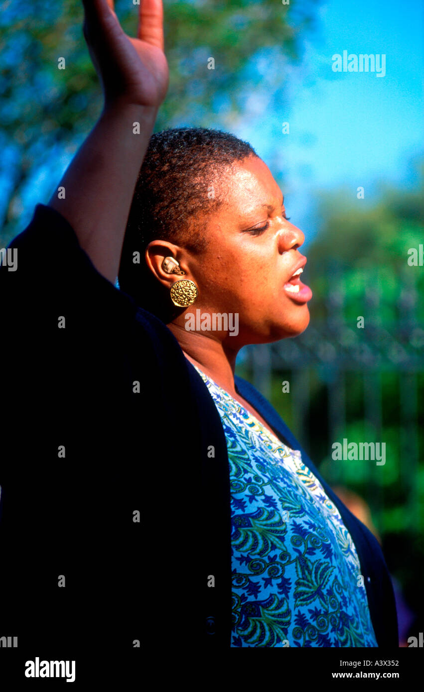 Woman street performer singing New Orleans Louisiana USA Stock Photo ...