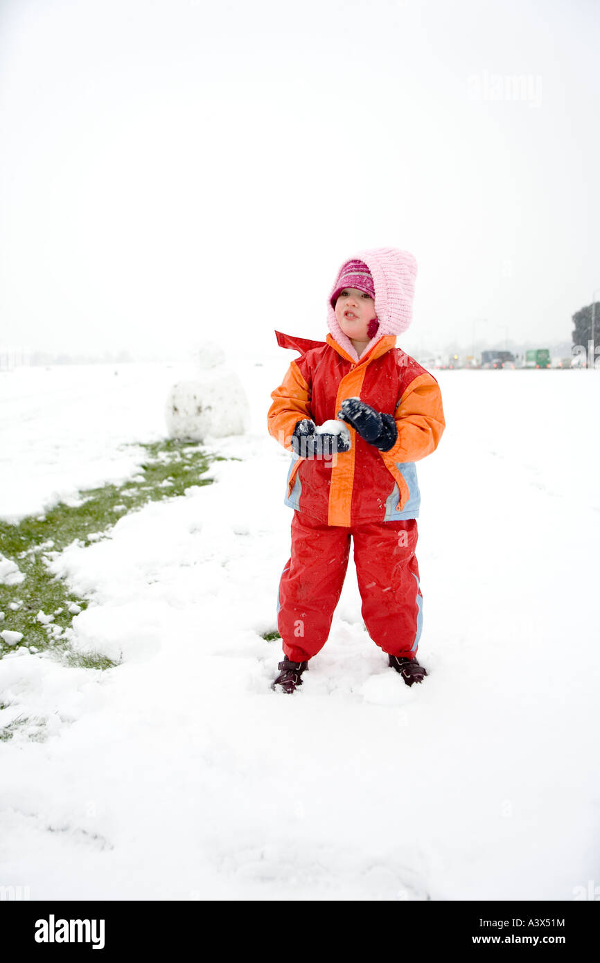 child with snowball Stock Photo - Alamy