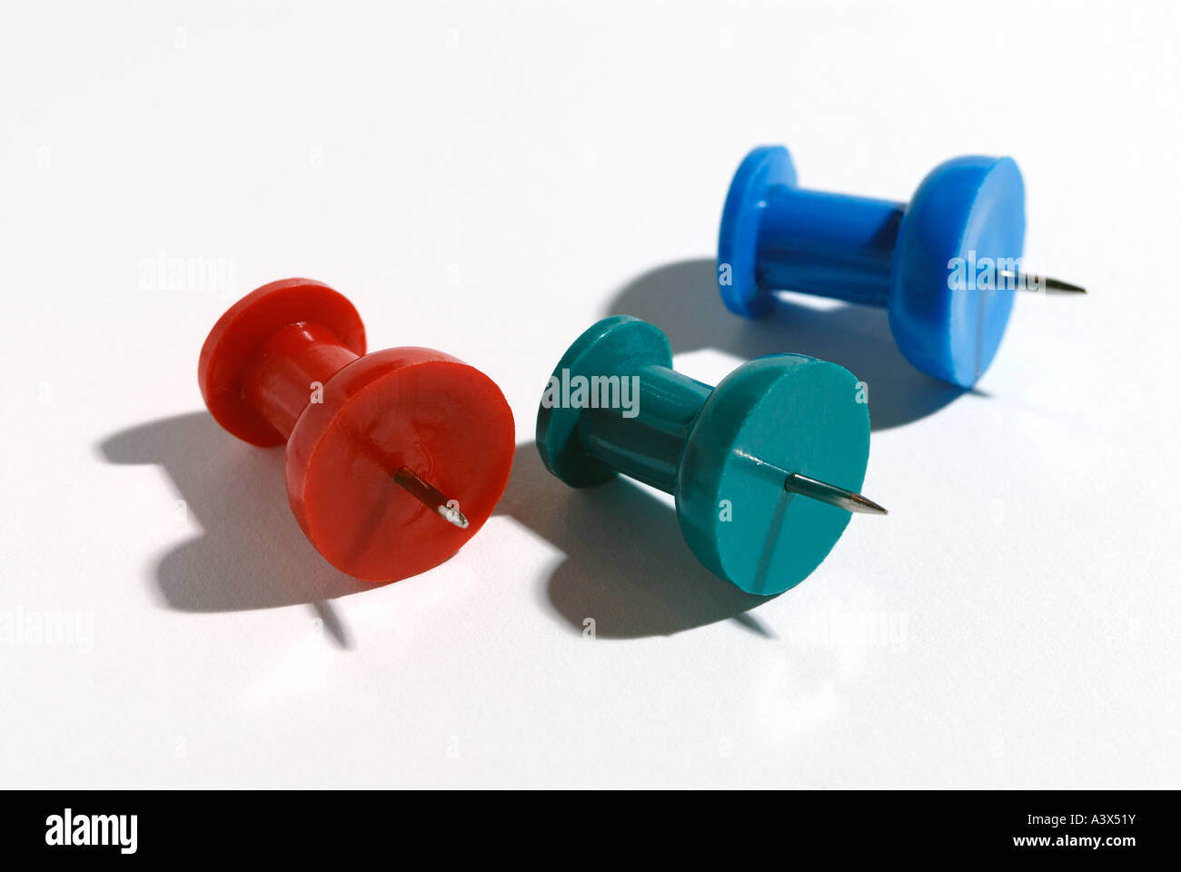 Red green and blue push pins Stock Photo - Alamy