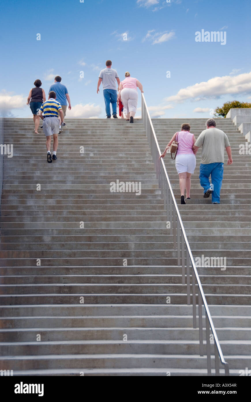 People climbing an open stairway Stock Photo - Alamy