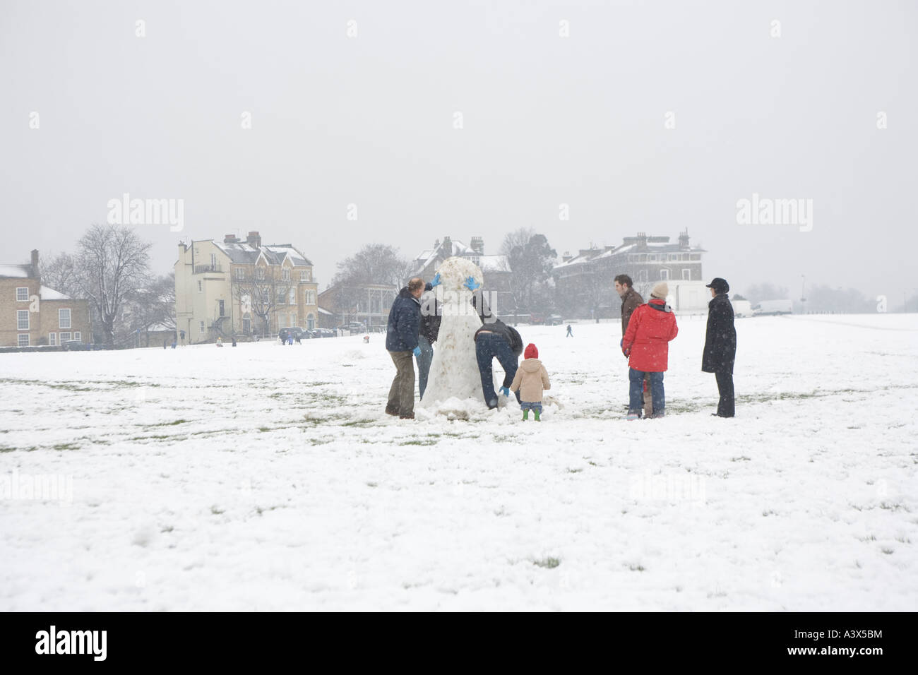 snow family group snowman Stock Photo - Alamy