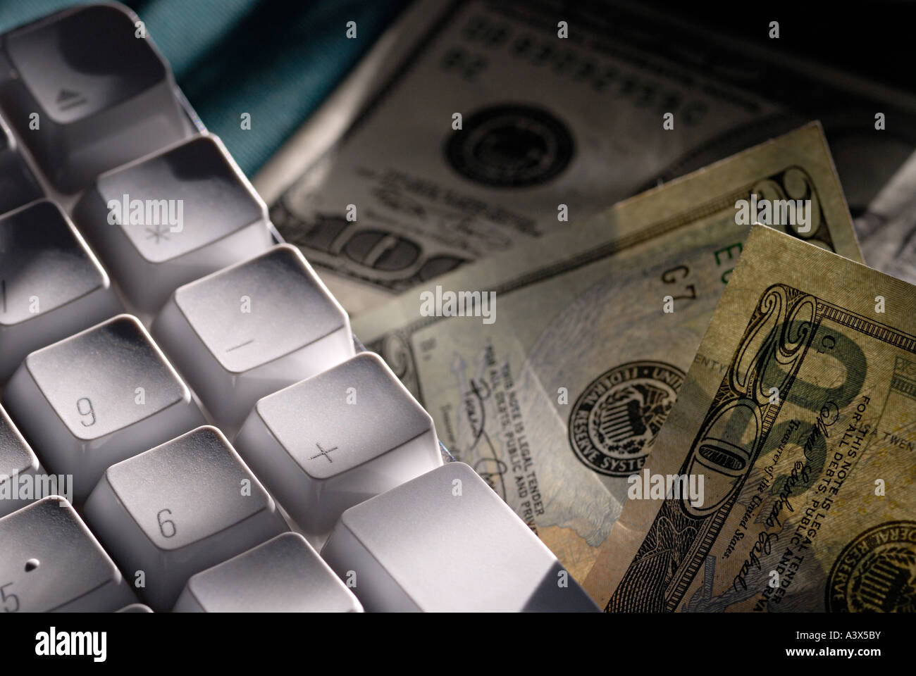 Computer technology and money Stock Photo - Alamy