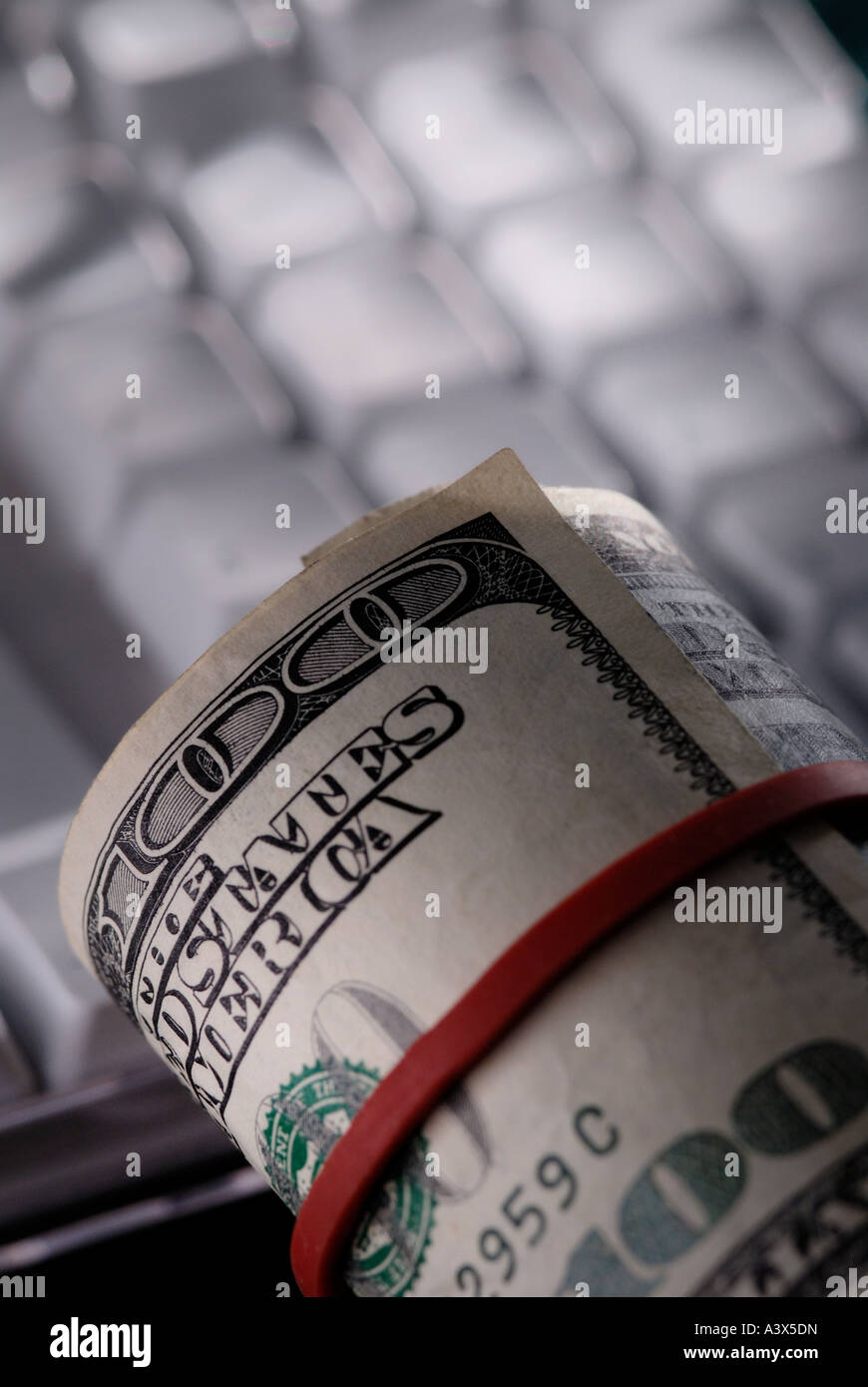 Computer technology and money Stock Photo - Alamy
