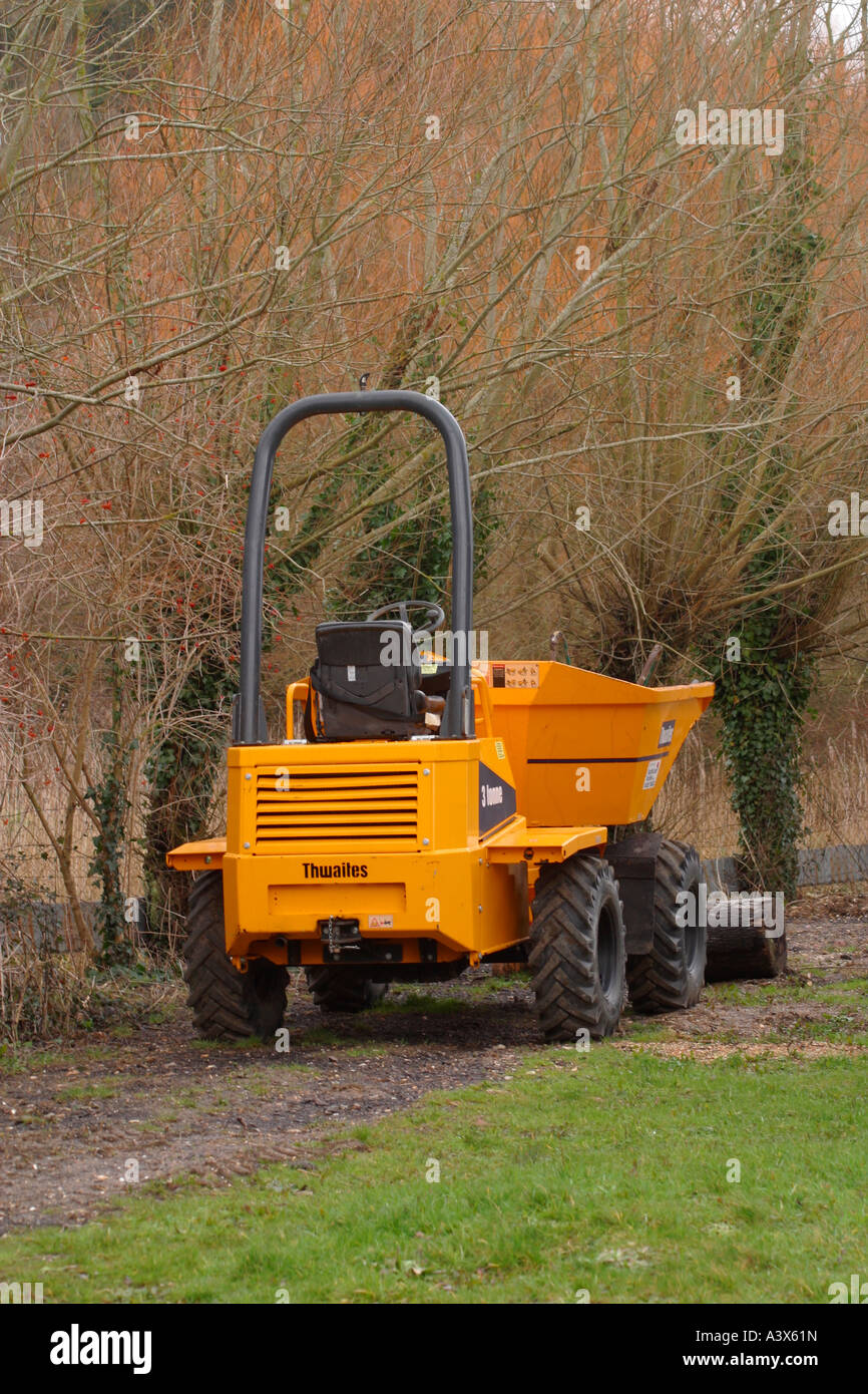 Yellow Thwaites front tipping dumper on farmland. Sussex, UK Stock ...
