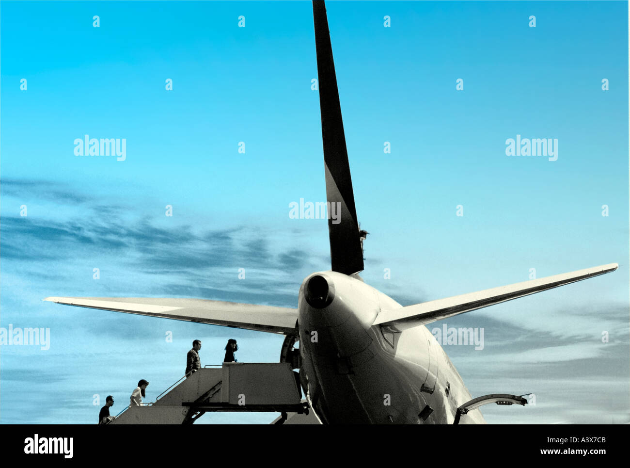 Passengers getting on a plane, photo by Bruce Miller Stock Photo - Alamy