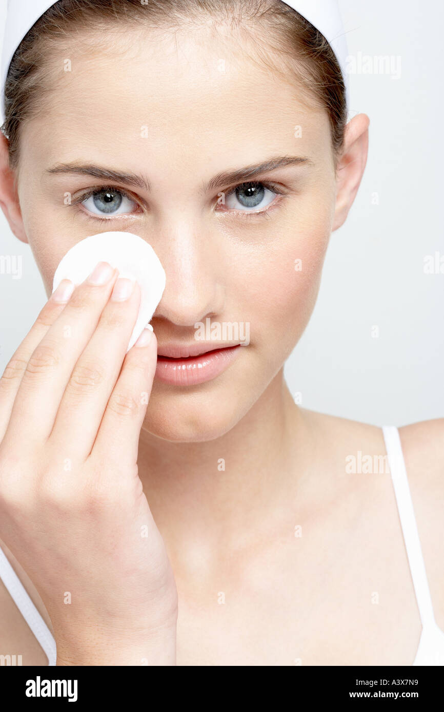 Woman removing her makeup hi-res stock photography and images - Alamy
