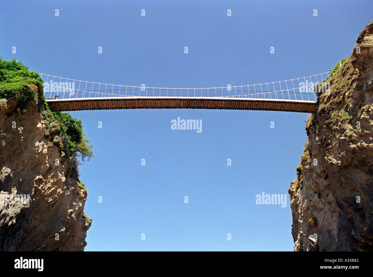 The bridge that links the island house to the mainland at Towan Beach ...