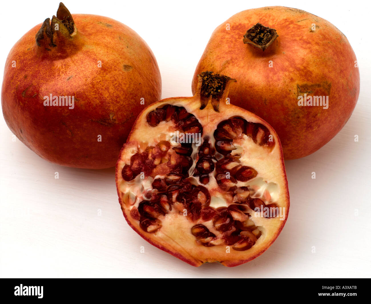 Whole and Half of Pomegranates Stock Photo - Alamy