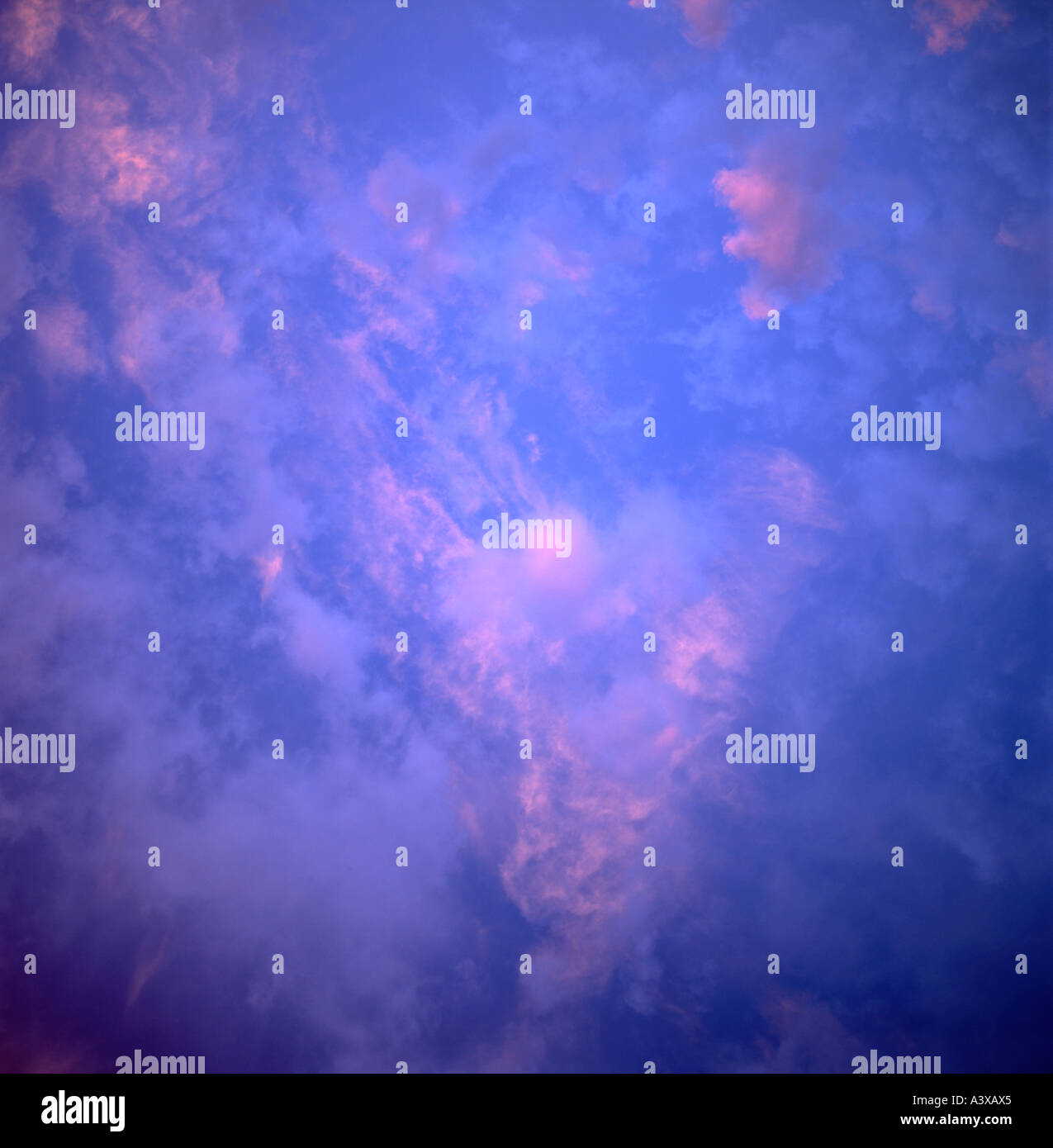 Sublime pink, blue and violet light and heavenly clouds in the evening ...