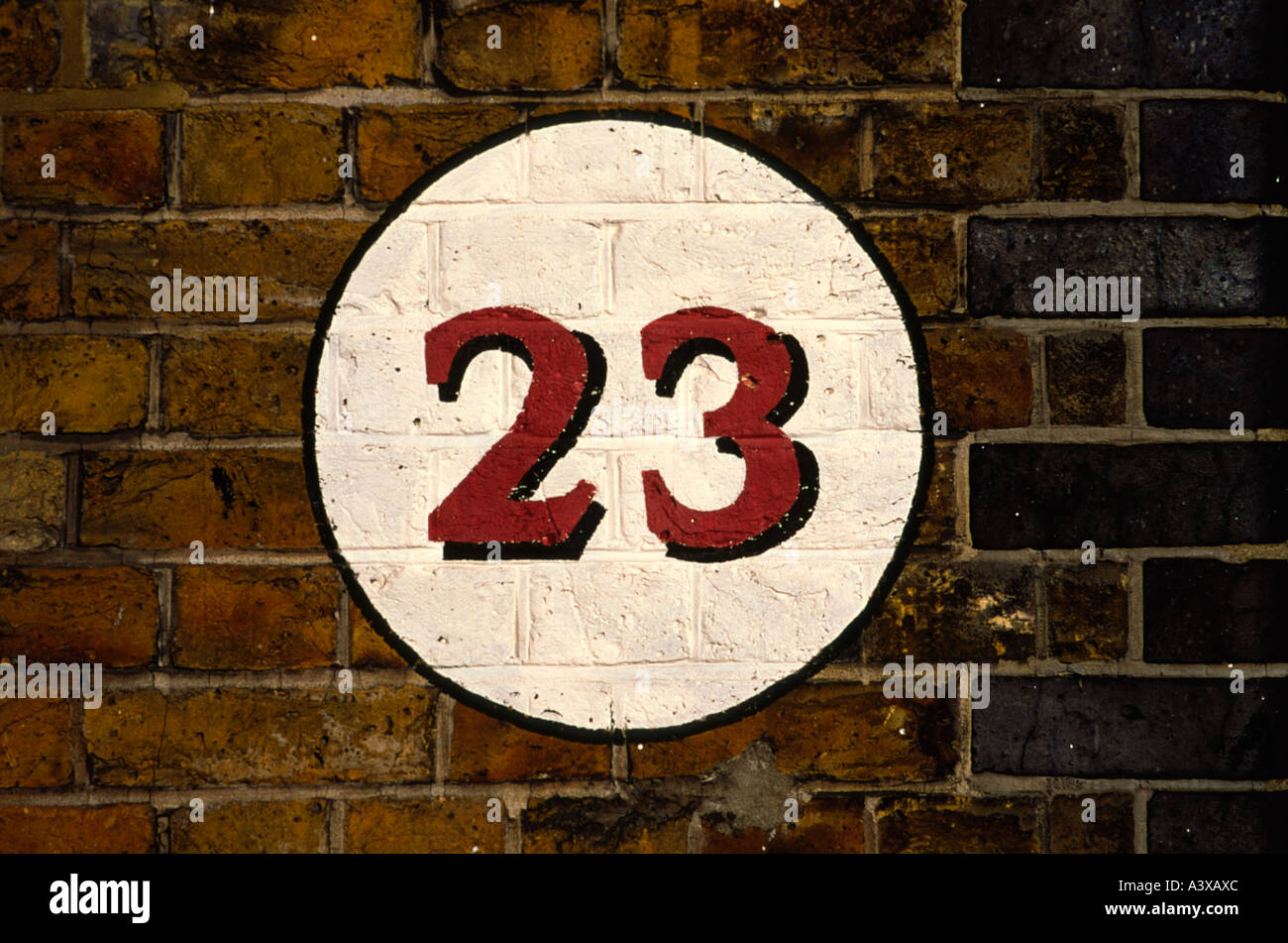 Number 23 painted on London brick England UK Stock Photo - Alamy