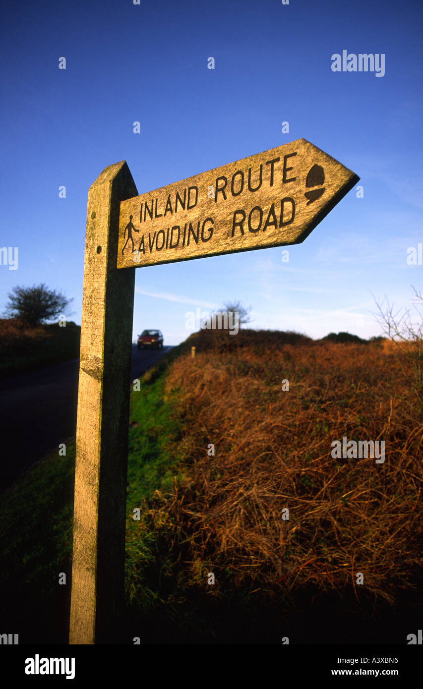 Inland Route Avoiding Road footpath sign in Dorset county England UK ...